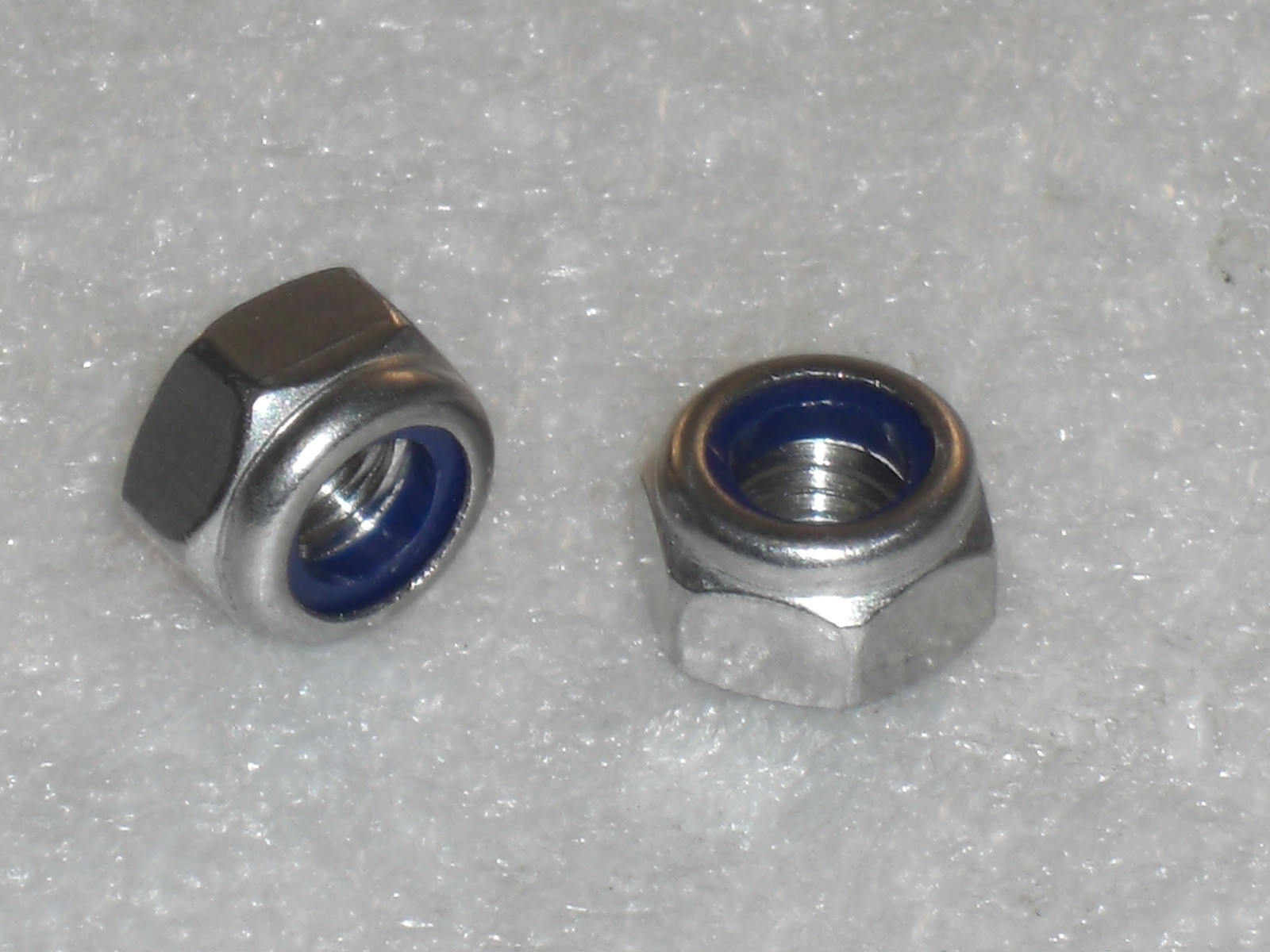 M5 Nyloc Nut LEFT HAND DIN985 A2 - Stig Fasteners Ltd